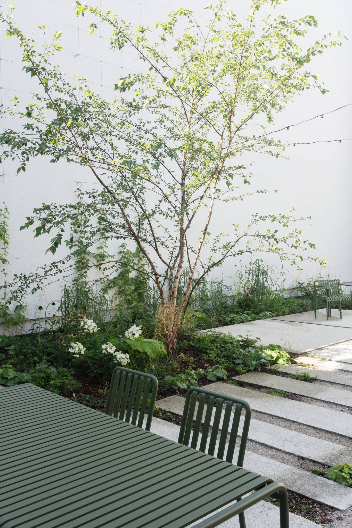 Garden Visit: A Verdant Courtyard in Lithuania - Gardenista